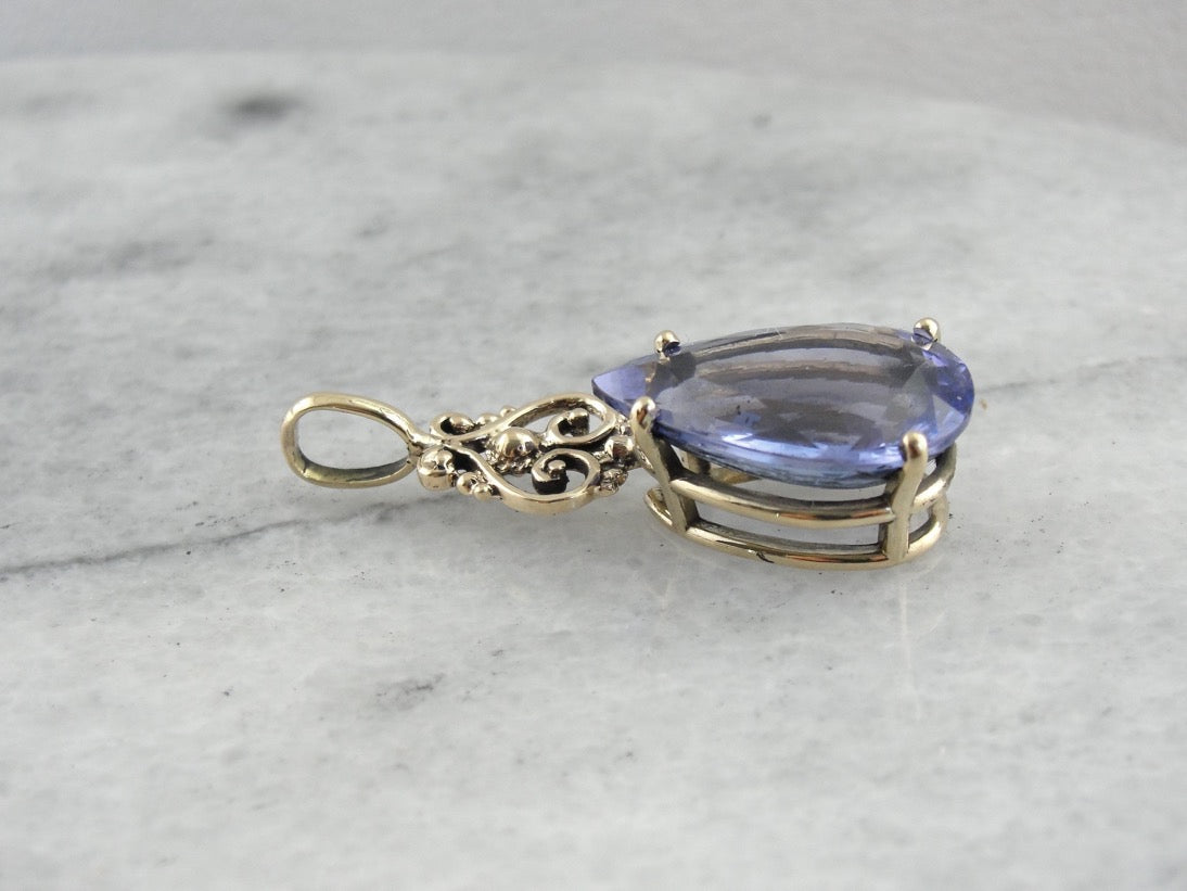 Stunning Tanzanite Pendant with Antique Victorian Accents